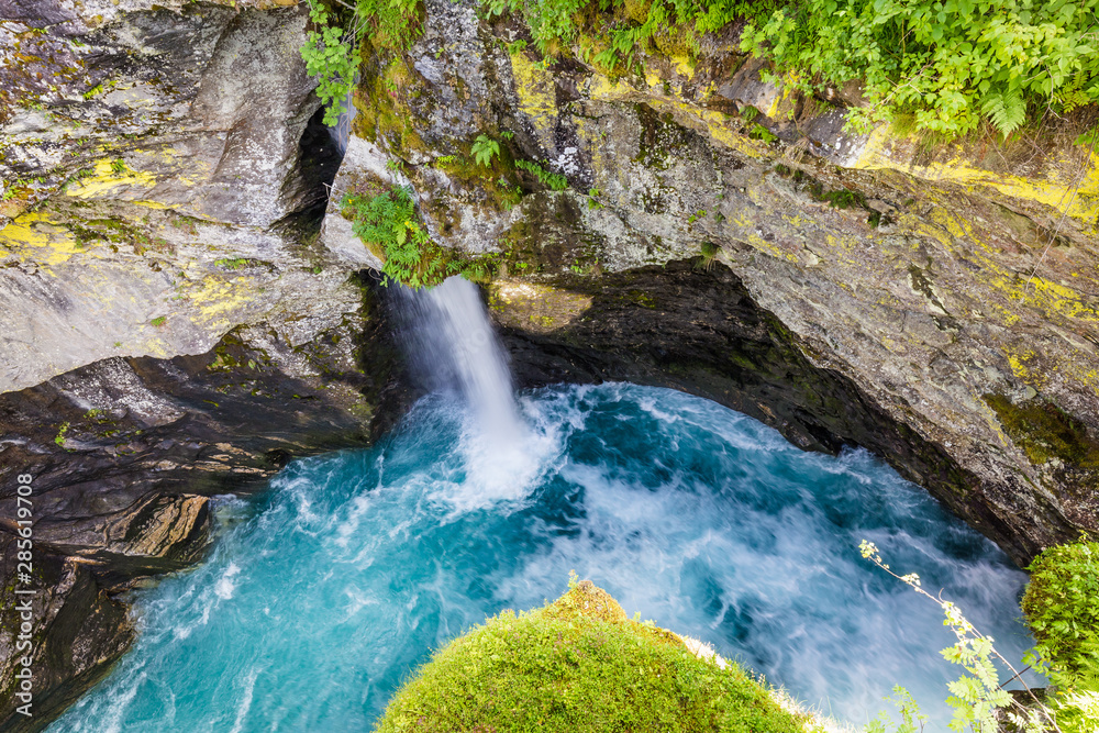 Pothole with waterfall at ravine Gudbrandsjuvet along national scenic ...
