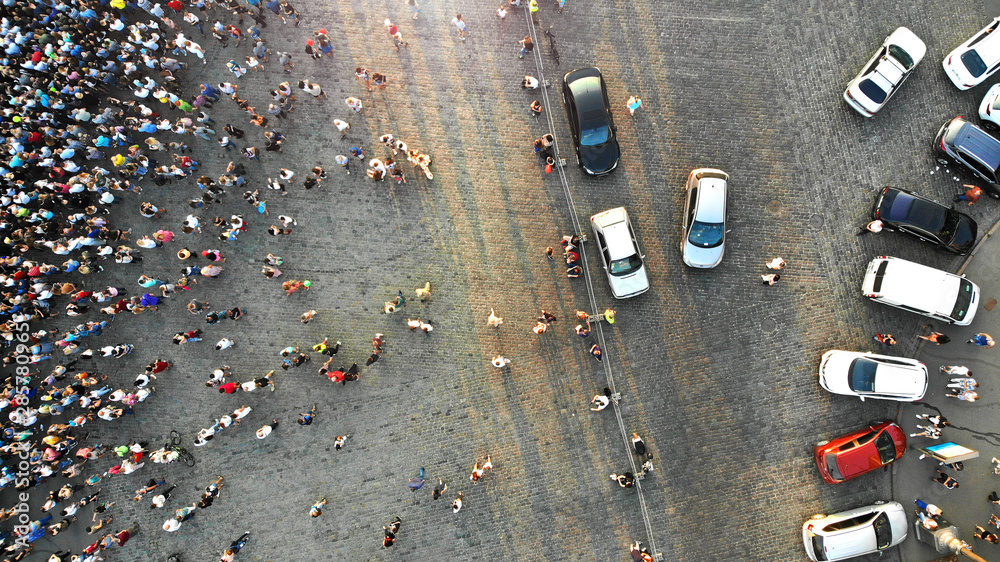 Aerial. Parking lot with cars and people crowd. Crowded city square ...