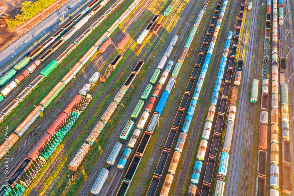 Rail sorting freight station with various railway cars, with many rail ...