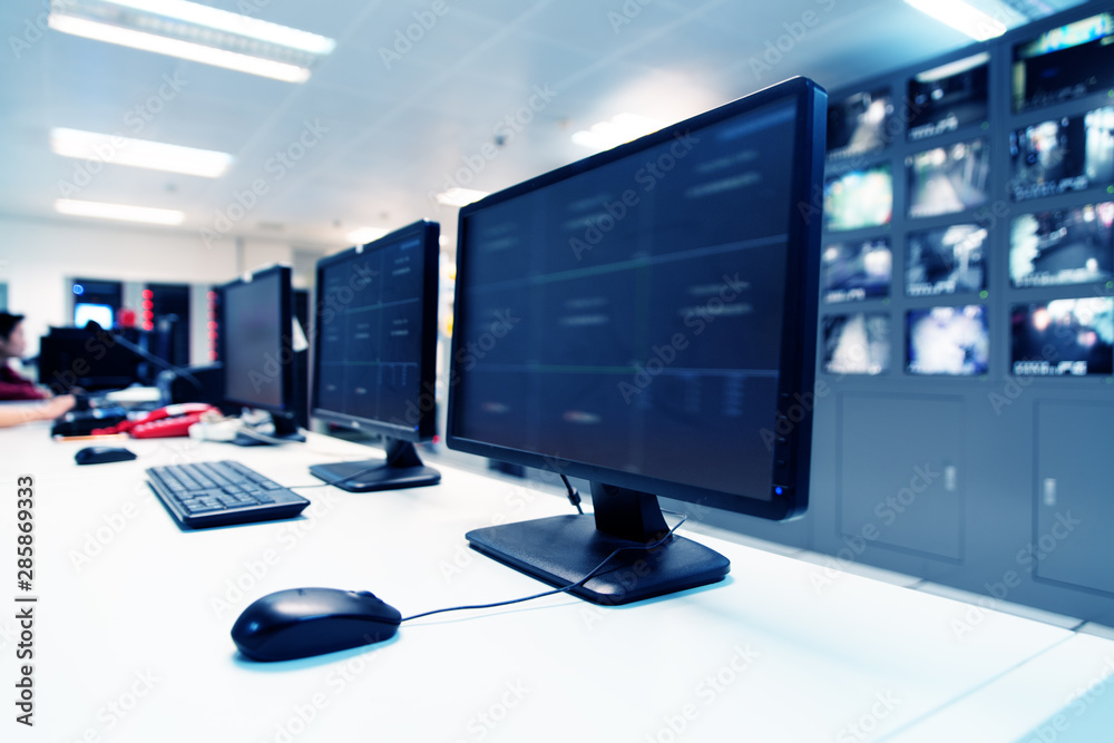 Foto de System Security Specialist Working at System Control Center ...