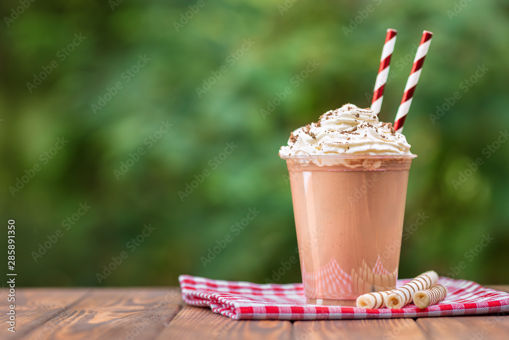 milkshake in disposable plastic cup Stock Photo | Adobe Stock