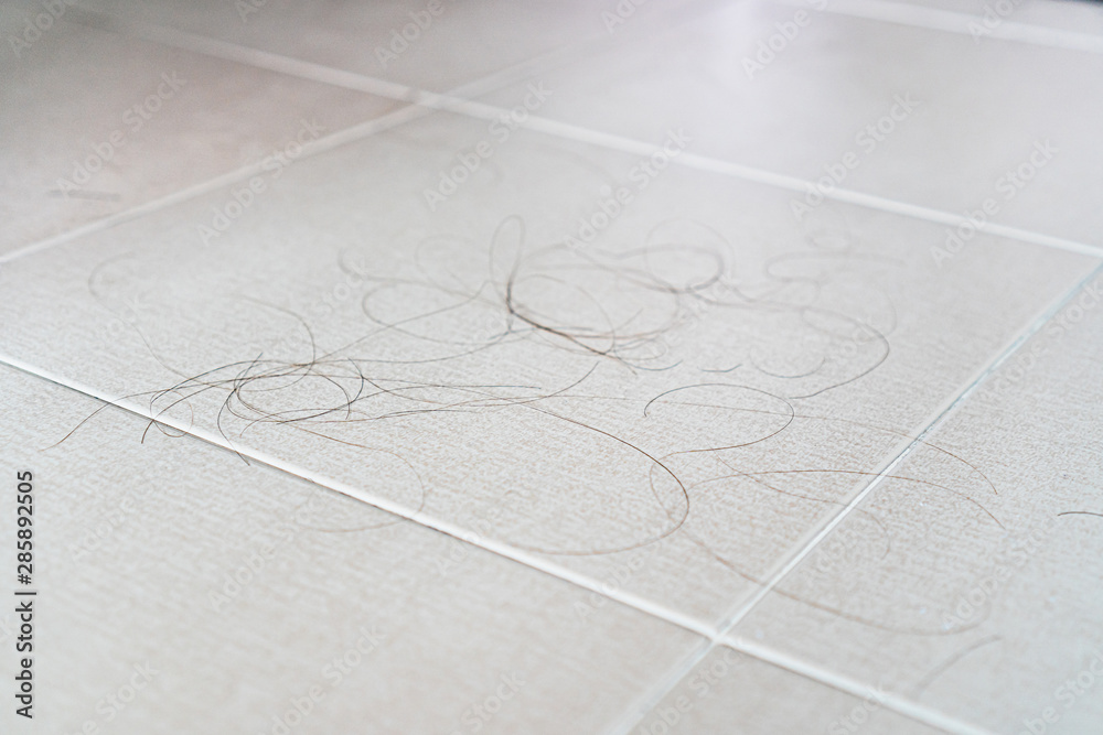 Group of Hair fall down on the floor after brushed hair. Alopecia ...