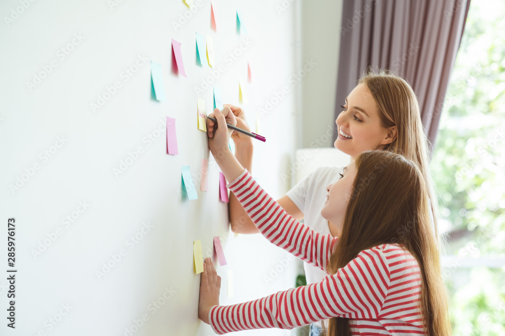 People use post it notes to share idea. Brainstorming concept. Sticky ...