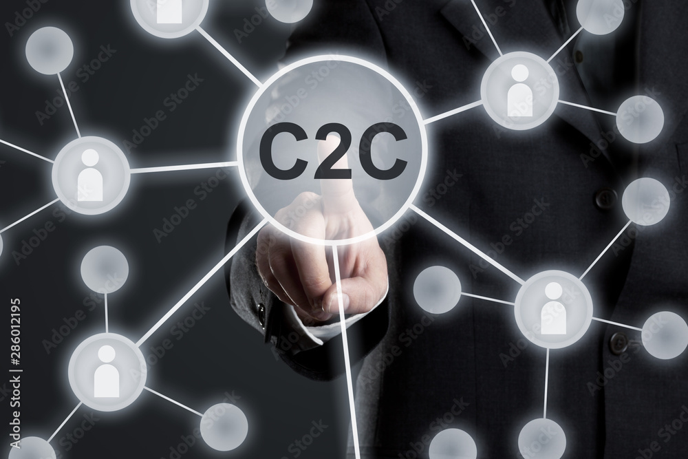 Executive businessman in suit touching C2C button in network with ...