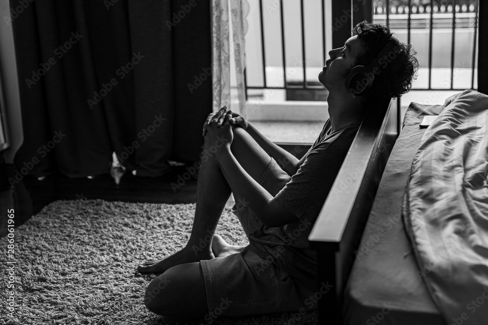 Man Listening To Sad Music