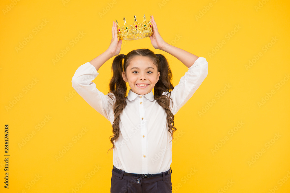 Winner revealed Happy little prize winner putting crown jewel on head ...