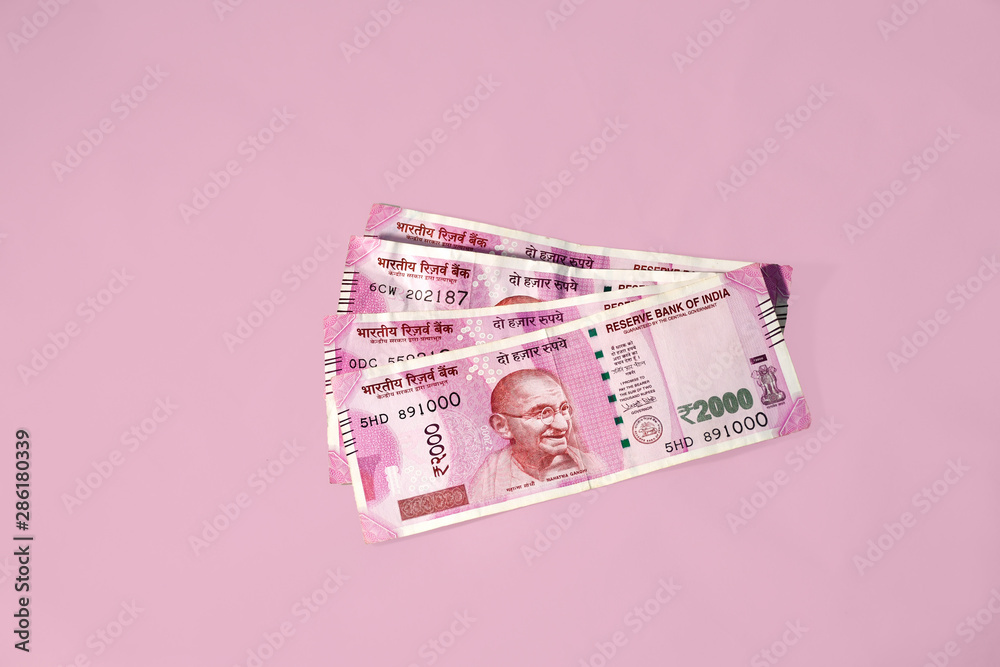 Modern Indian Two Thousand Rupees Currency Note on a minimal green ...