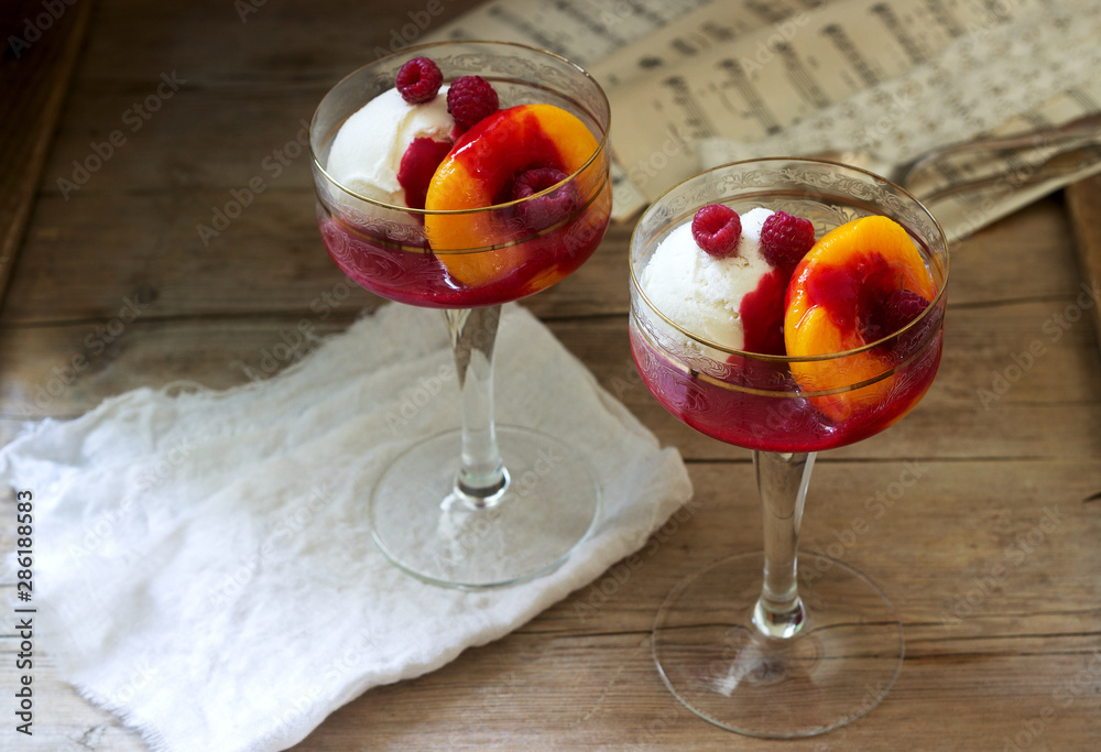 Ice cream, peach and raspberry sauce dessert dedicated to Australian ...