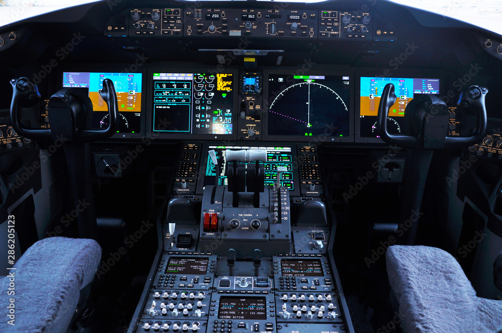 Cockpit of a widebody commercial aircraft Stock Photo | Adobe Stock