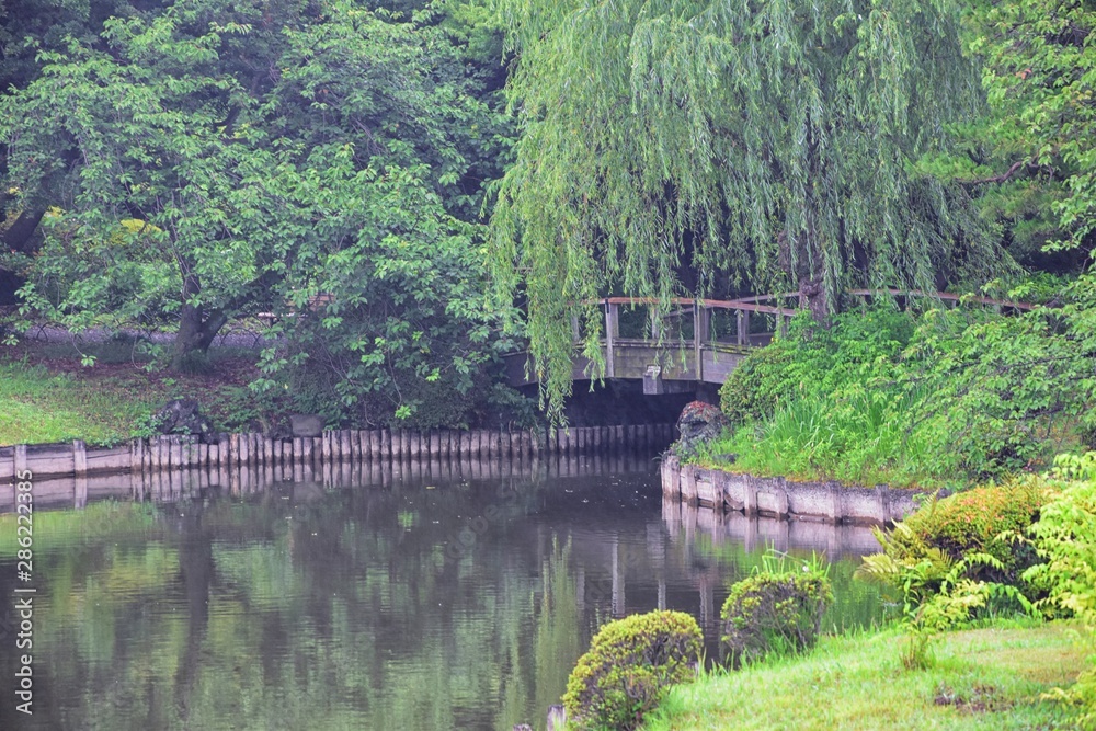 Traditional Japanese gardens in public parks in Tokyo, Japan. Views of ...