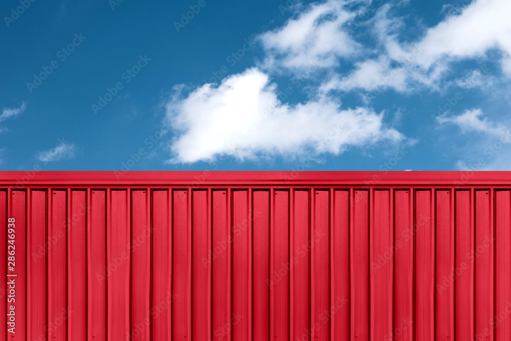 texture of red cargo ship container located with blue sky background ...