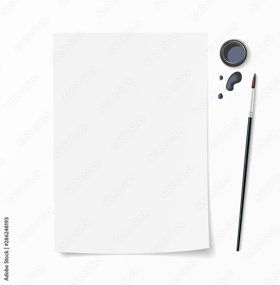 White paper document whith brush pen, inkwell and ink drops on desk ...