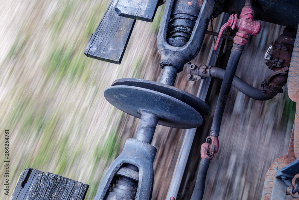 Detail of connection of a vintage train cars with blurred background ...