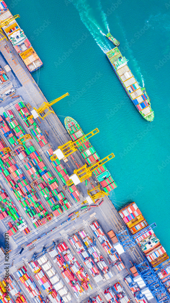 Top view of Deep water port with cargo ship and containers. It is an ...