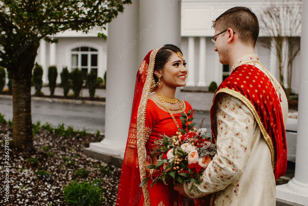 Happy indian bride and groom are looking at each other in love Stock ...