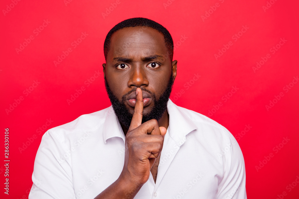 Dark skin guy begging to stop talking and keep silence wear white shirt ...