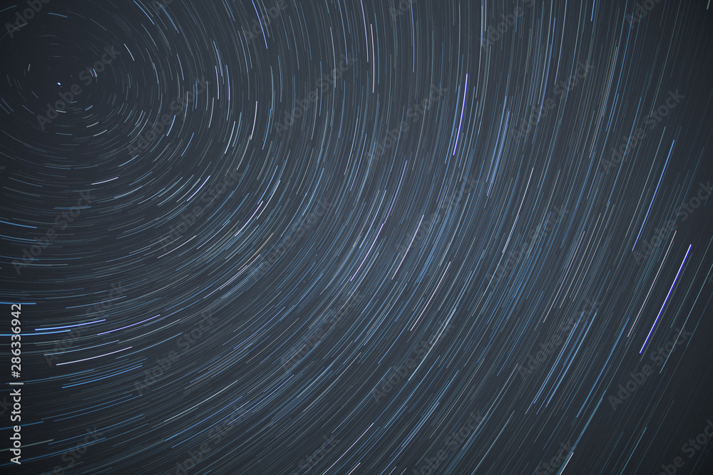 Astro photography time lapse of star trails rotating around the north ...