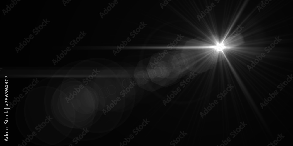 Lens flare light over black background. Easy to add overlay or screen ...