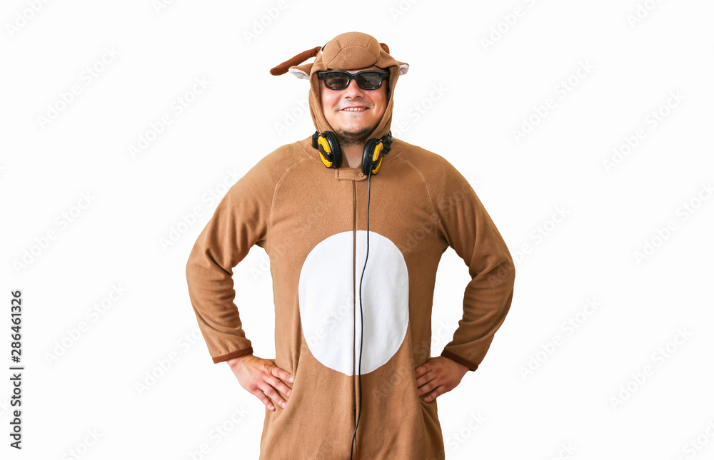 Man in cosplay costume of a cow with reel tape recorder. Guy in the ...