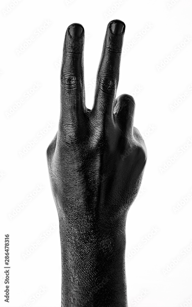 Black hand on white background, isolated, paint. ..Male hand isolated ...