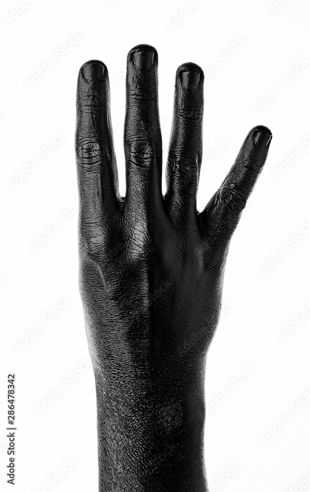 Black hand on white background, isolated, paint. ..Male hand isolated ...