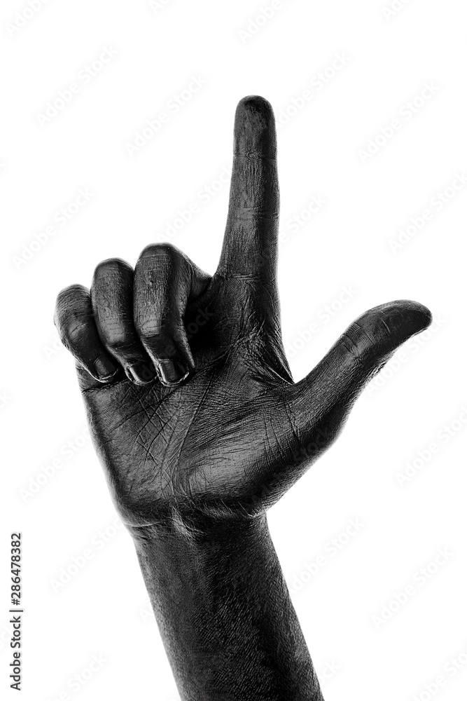 Black hand on white background, isolated, paint. ..Male hand isolated ...