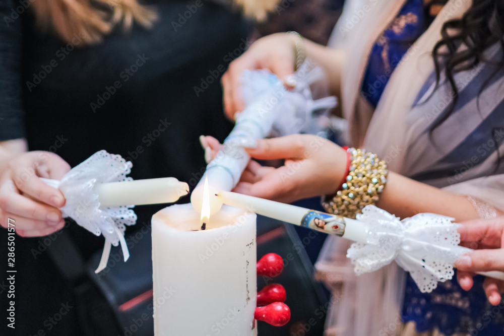 Catholic church ceremony first holy communion items and lit candles at ...