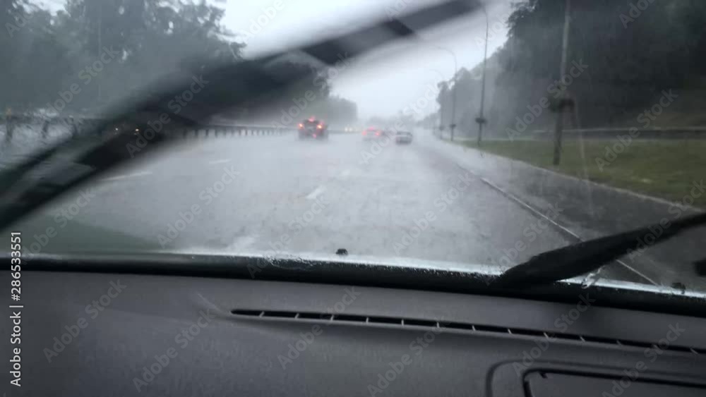 Road and car under rain Stock Video | Adobe Stock