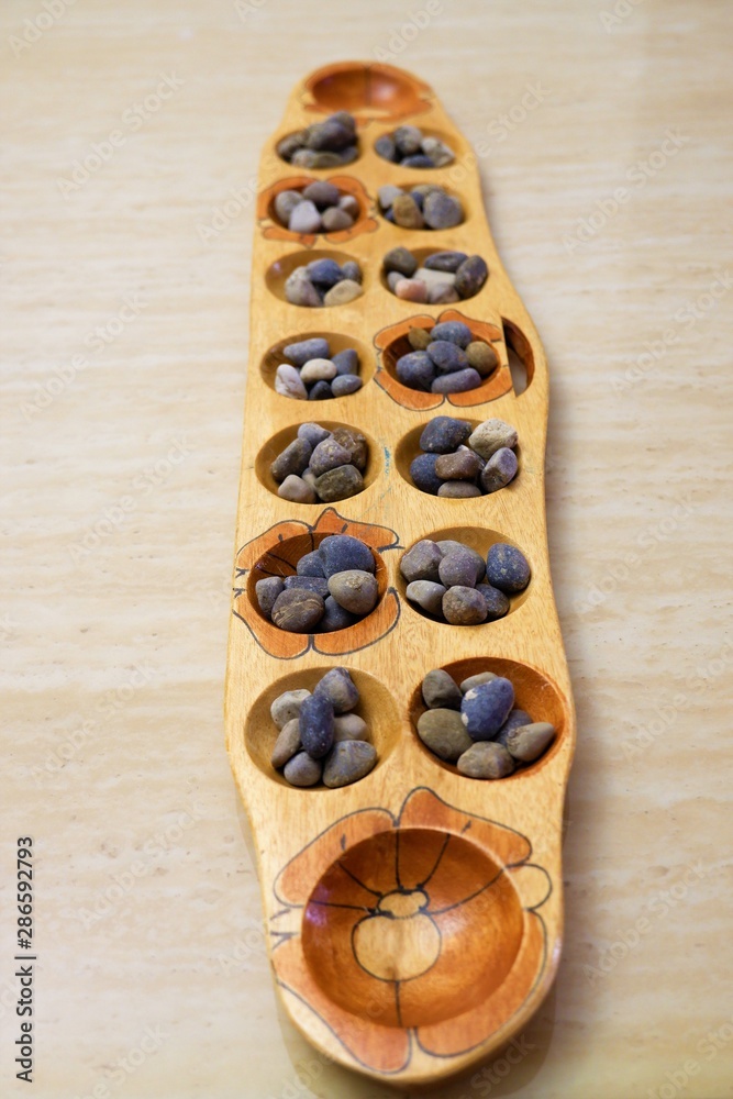 sungka Stock Photo | Adobe Stock