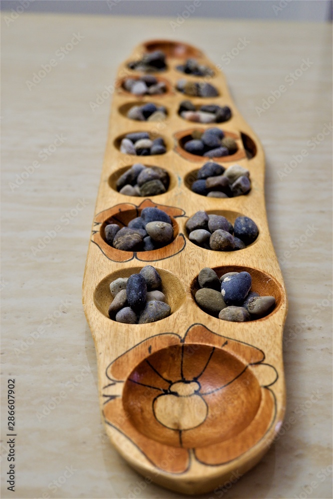 sungka Stock Photo | Adobe Stock