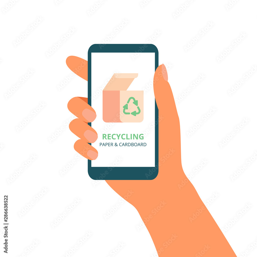 Hand holds mobile phone with green concept of recycle paper and ...