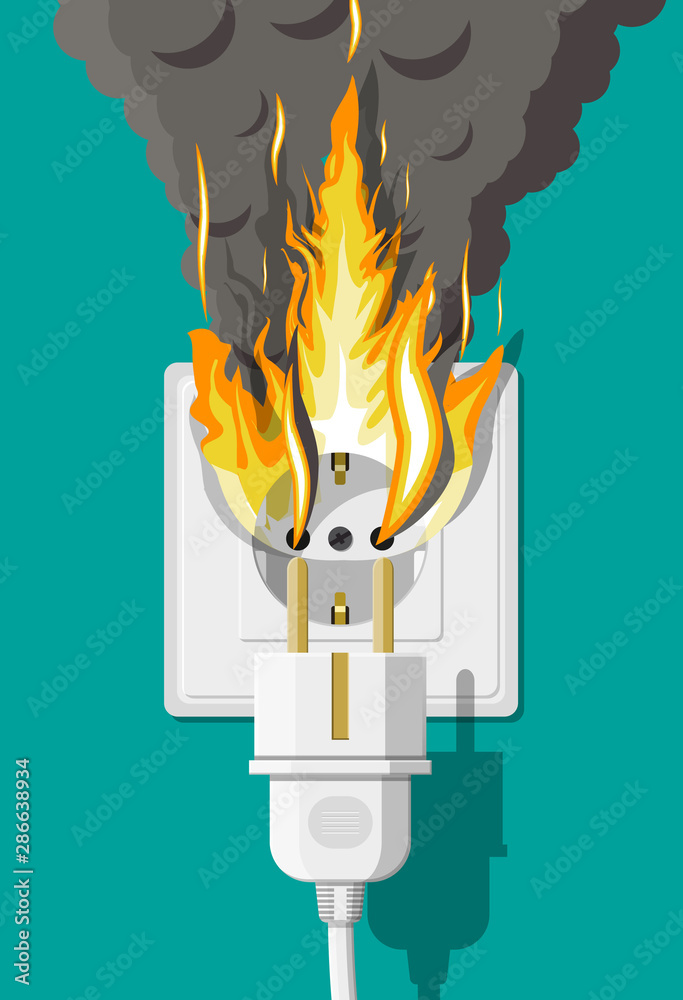 Electrical outlet with plug on fire. Overload of network. Short circuit ...
