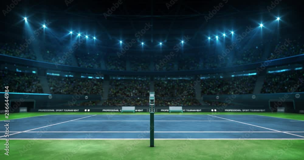 Illuminated tennis blue court before the game in a hall full of fans ...
