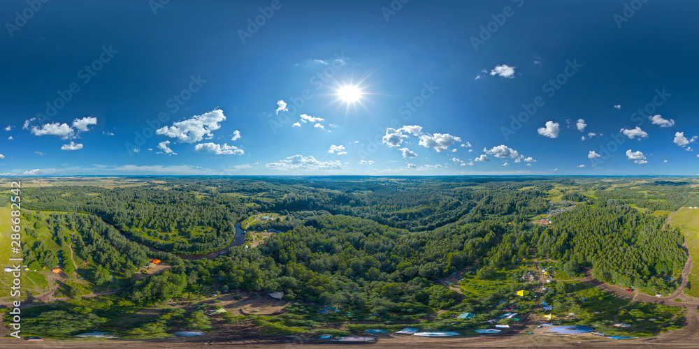 360-degree panoramic aerial view of a field and a meandering river in a ...