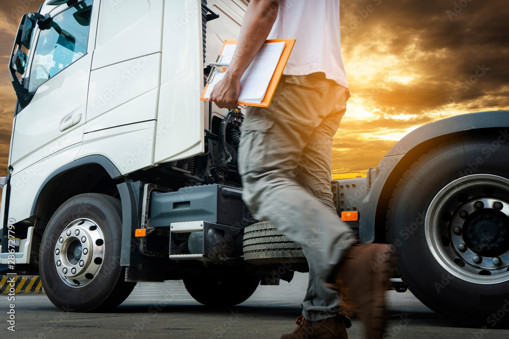 Truck Drivers Checking the Truck's Safety Maintenance Checklist ...