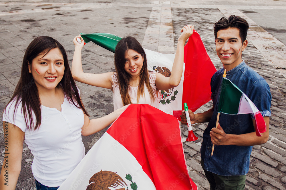 mexican guys cheering Viva Mexico on independence day in Mexico city ...