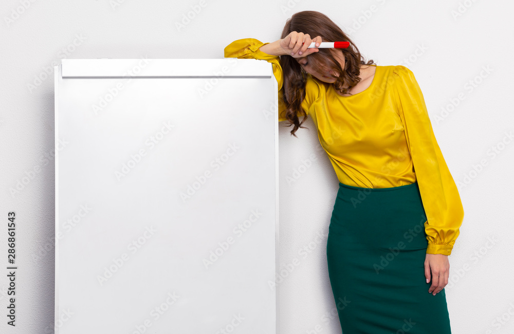 the teacher was upset in the classroom at the whiteboard. girl sleeping ...