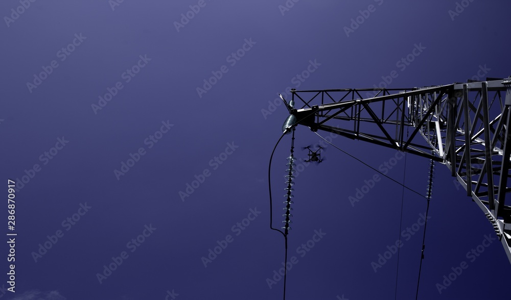 Drone in air nea a bridge and energy objects Stock Photo | Adobe Stock