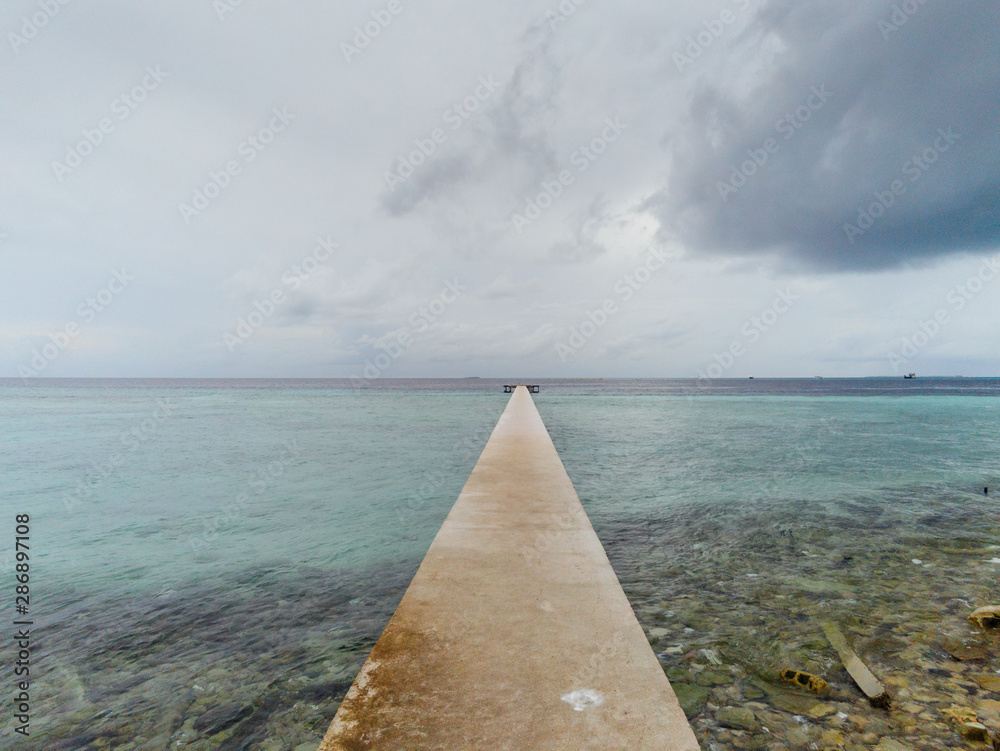 Jetty for boats in an atoll in the Maldives Stock Photo | Adobe Stock