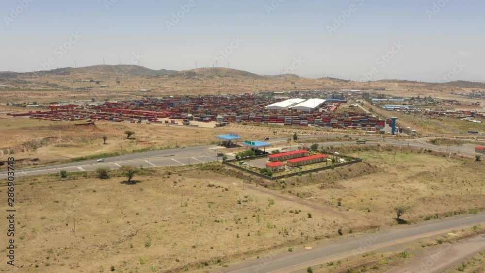 Aerial view of toll booth of new highway and container terminal of Mojo ...