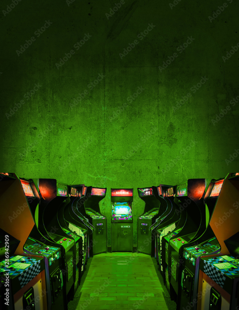 Old Unbranded Vintage Arcade Video Games in a dark gaming room with ...