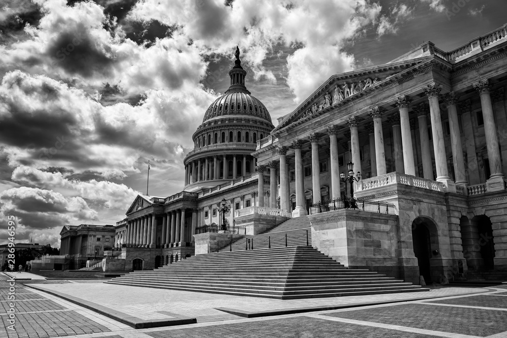 Dark and foreboding black and white view of the US Capitol Building in ...