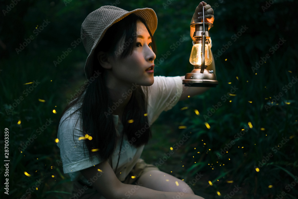 The little girl saw flying elves in the mountains and forests on summer ...