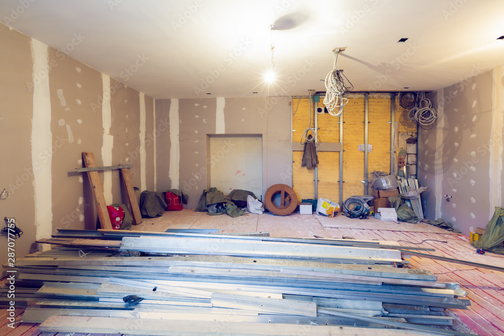 Working process of renovate room with installing drywall or gypsum ...