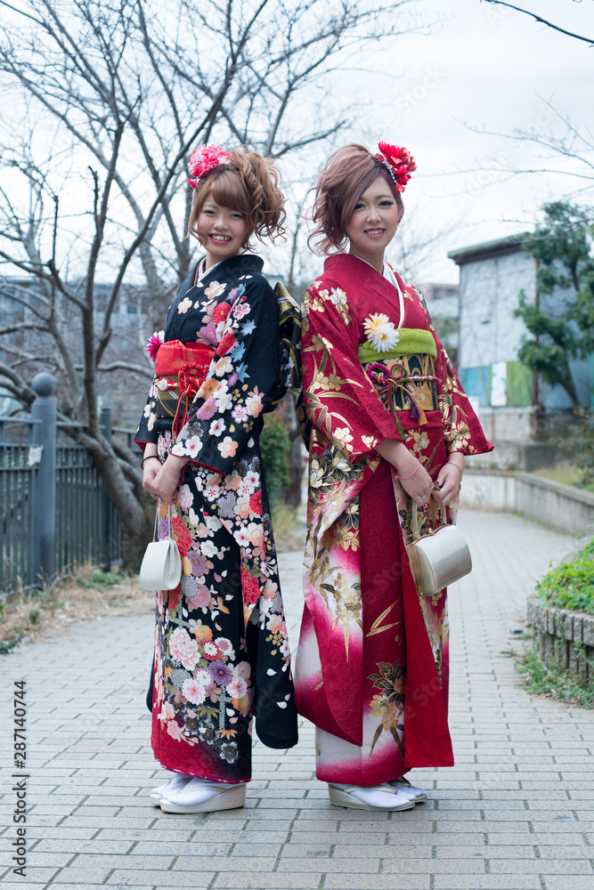 Japanese girls posing for the pictures of the Coming of Age Day. In ...