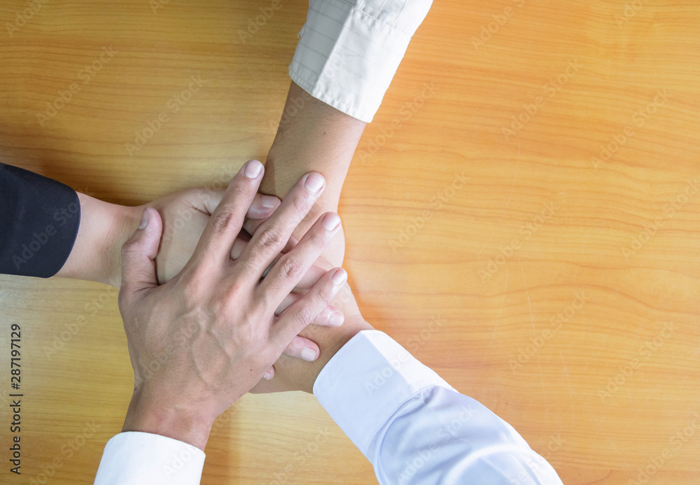 Group hands unity with their hands together ,concept successful ...