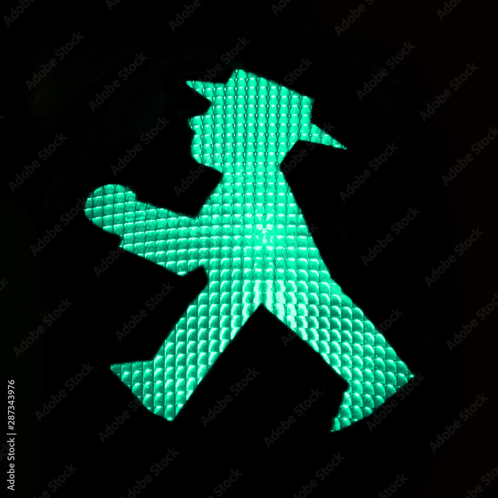 Green pedestrian traffic light with the Ampelmann of East Germany ...