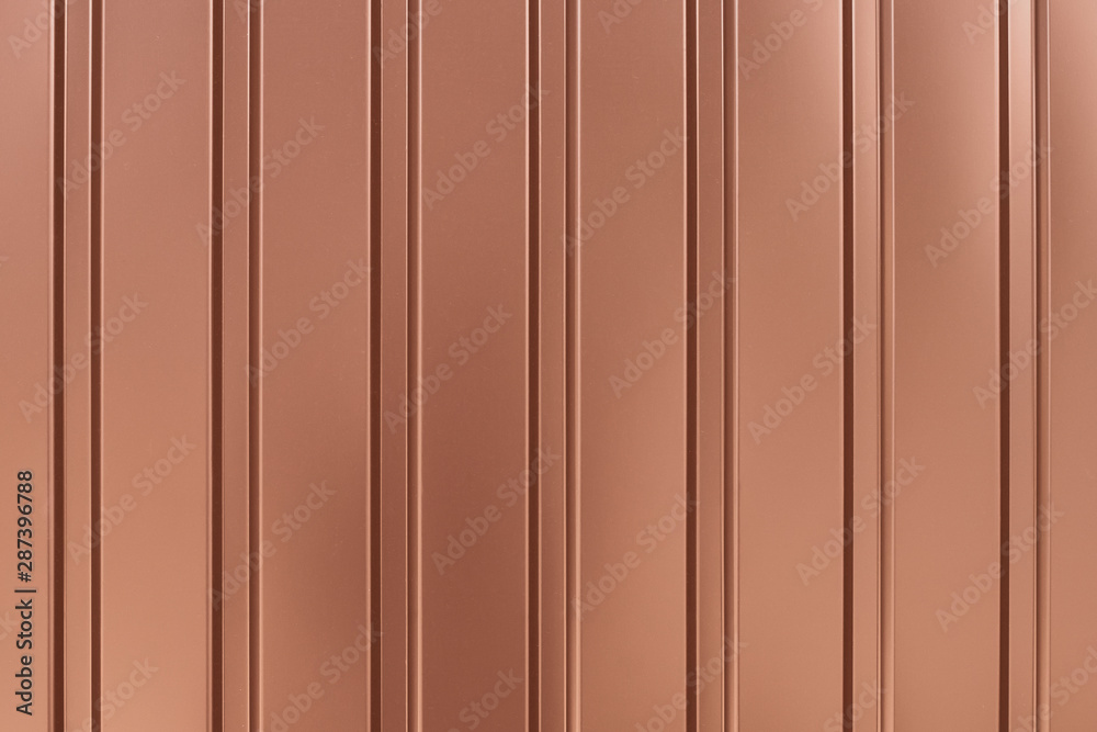 Light brown metallic striped surface. Gold background of metalline wall ...