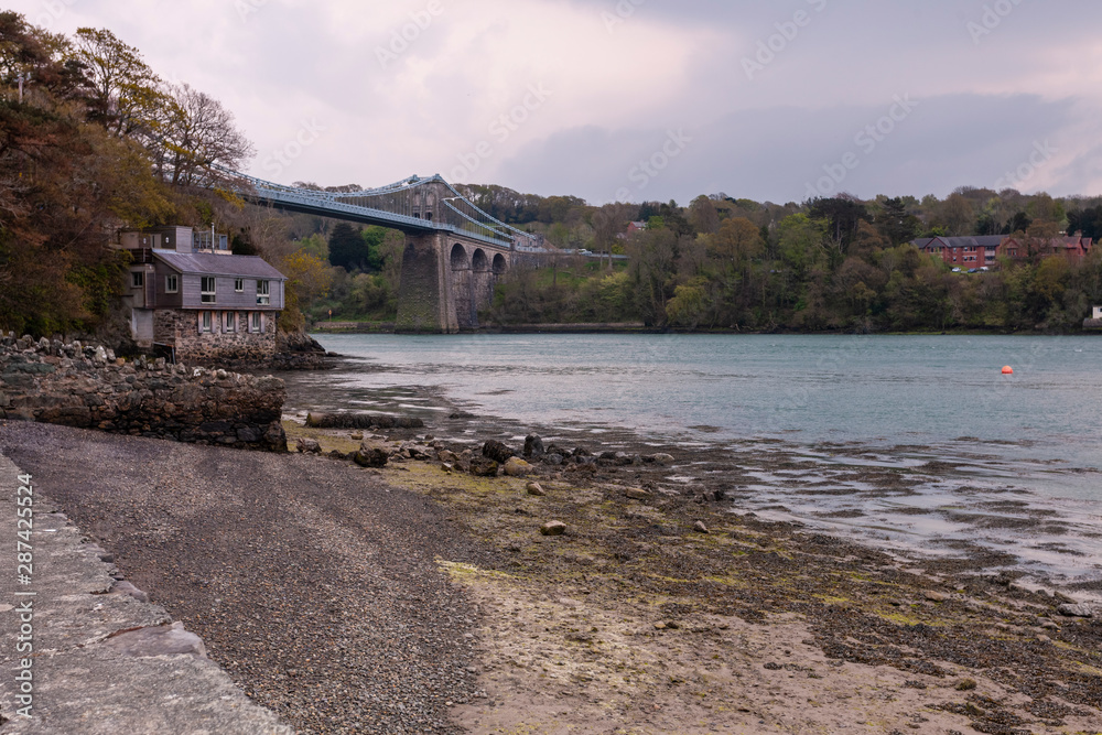 The Menai Strait is a narrow stretch of shallow tidal water about 25 km ...