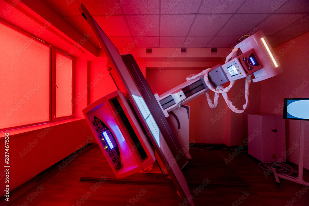 X-ray room in a hospital. Classic ceiling-mounted x-ray system. Stock ...